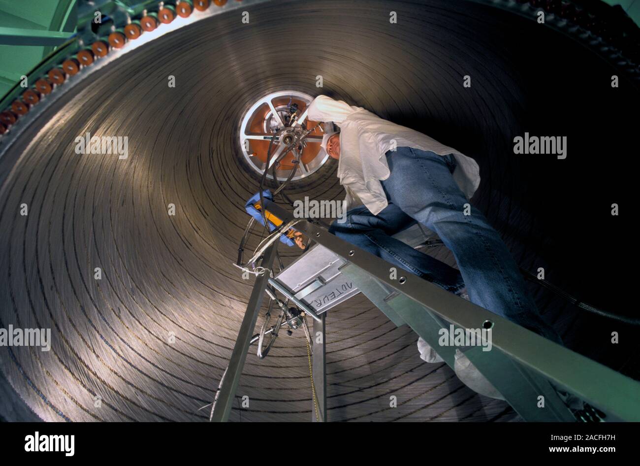 Ariane 5 engine nozzle production. Worker testing the cooling system ...