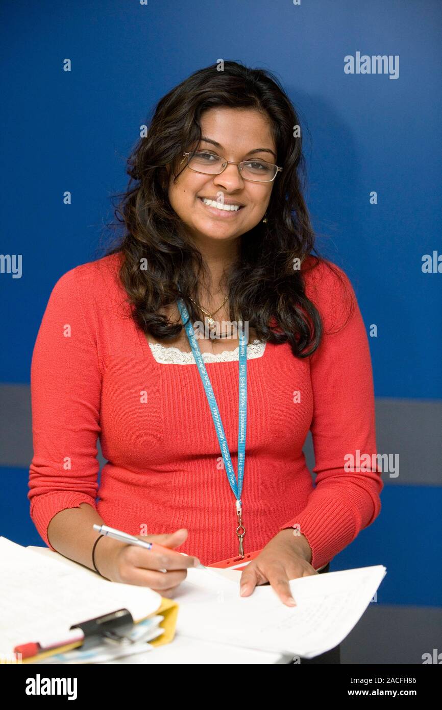 Hospital doctor smiling. Photographed at the West Middlesex University ...