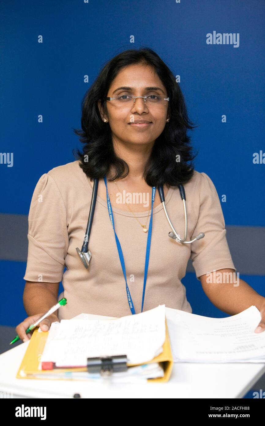 Hospital doctor smiling. Photographed at the West Middlesex University ...