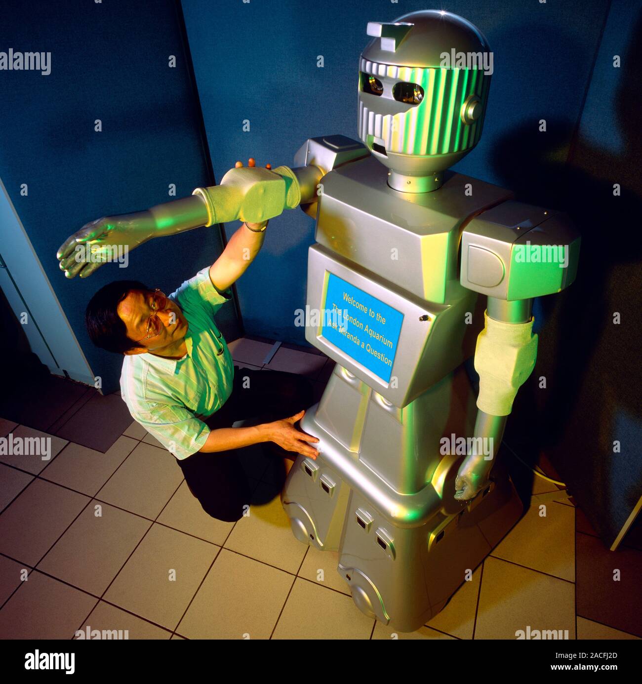 Interactive guide robot. Professor Huosheng Hu with Miranda, a fully ...