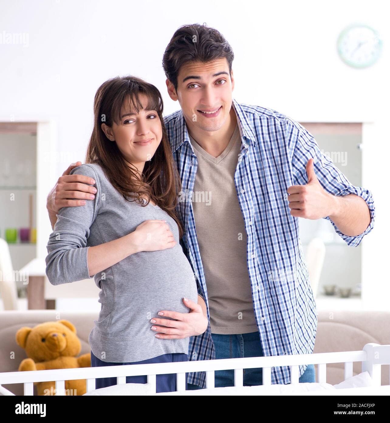 Young parents expecting their first baby Stock Photo - Alamy