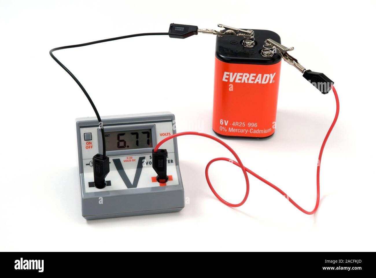 Measuring a battery's voltage. Voltmeter connected between the ...