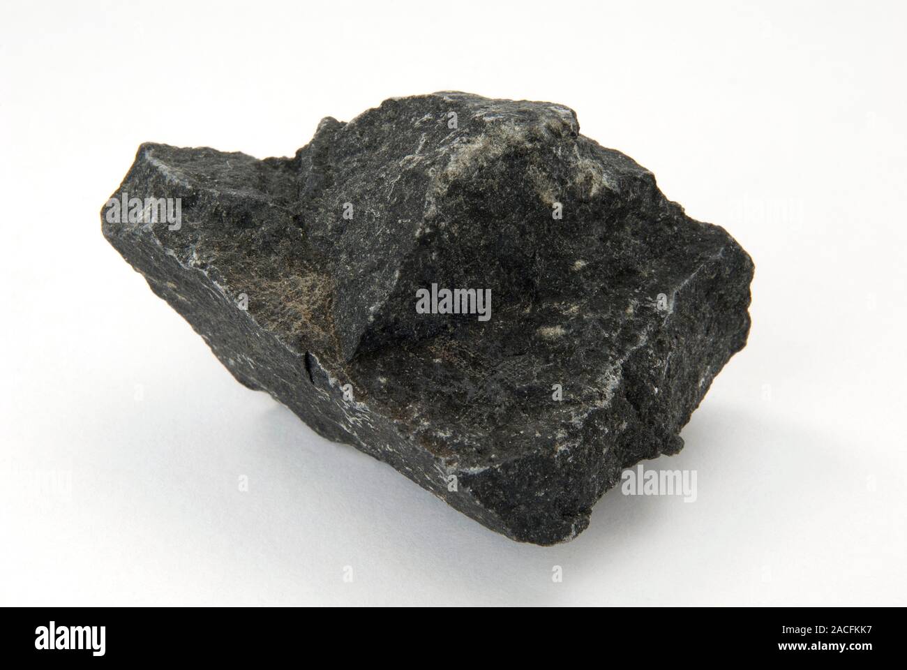Sample of basalt. Basalt is an extrusive (volcanic) igneous rock ...