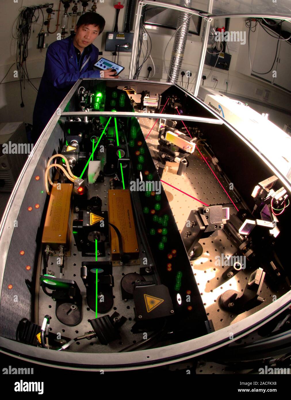 Hydrogen fuel cell research. Researcher working on a system for ...