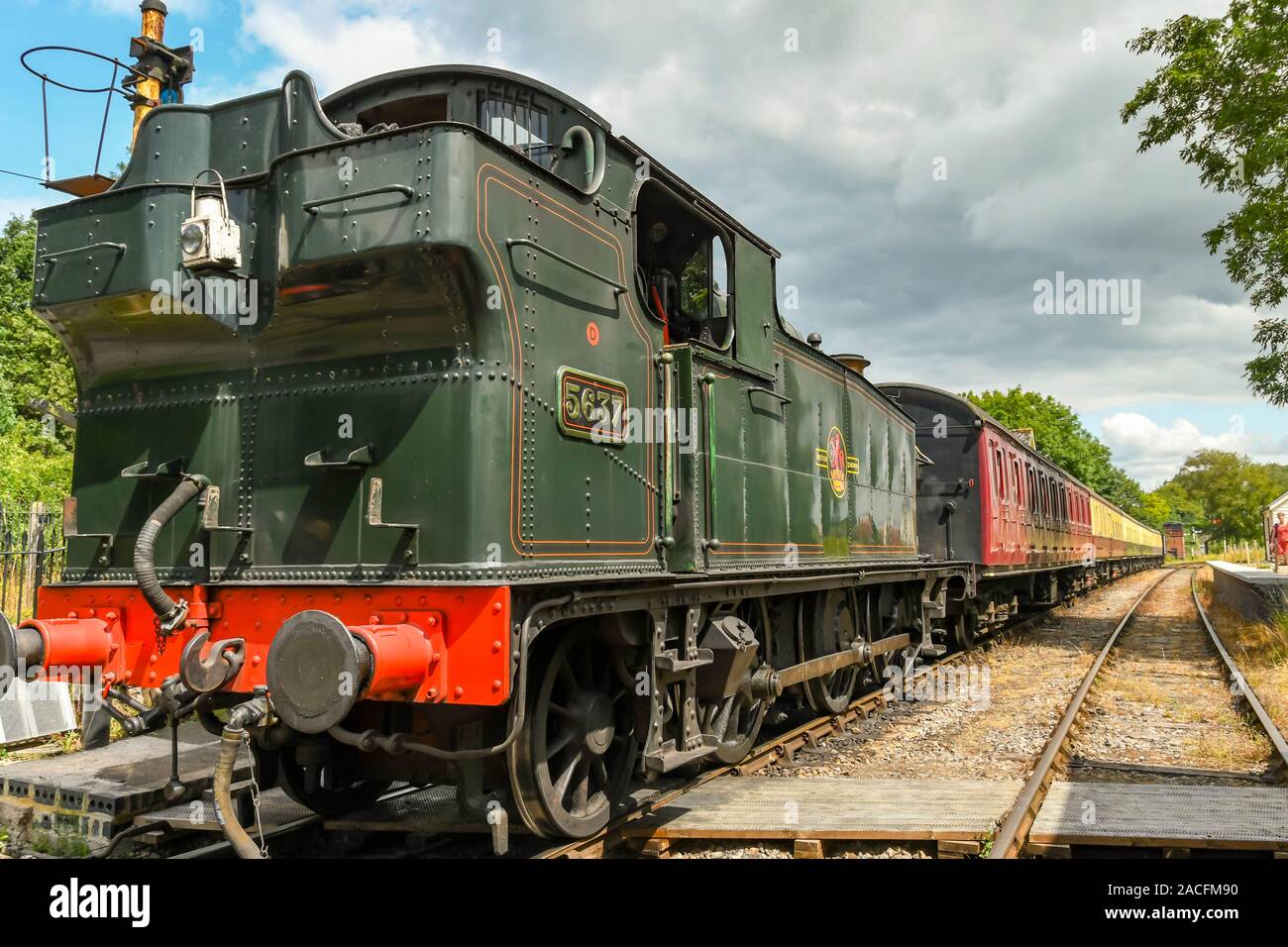 CRANMORE, ENGLAND - JULY 2019: Steam engine and train of carriages ...