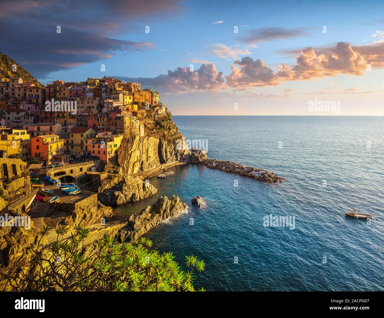 Manarola village on cliff rocks and sea, seascape in Five lands, Cinque ...