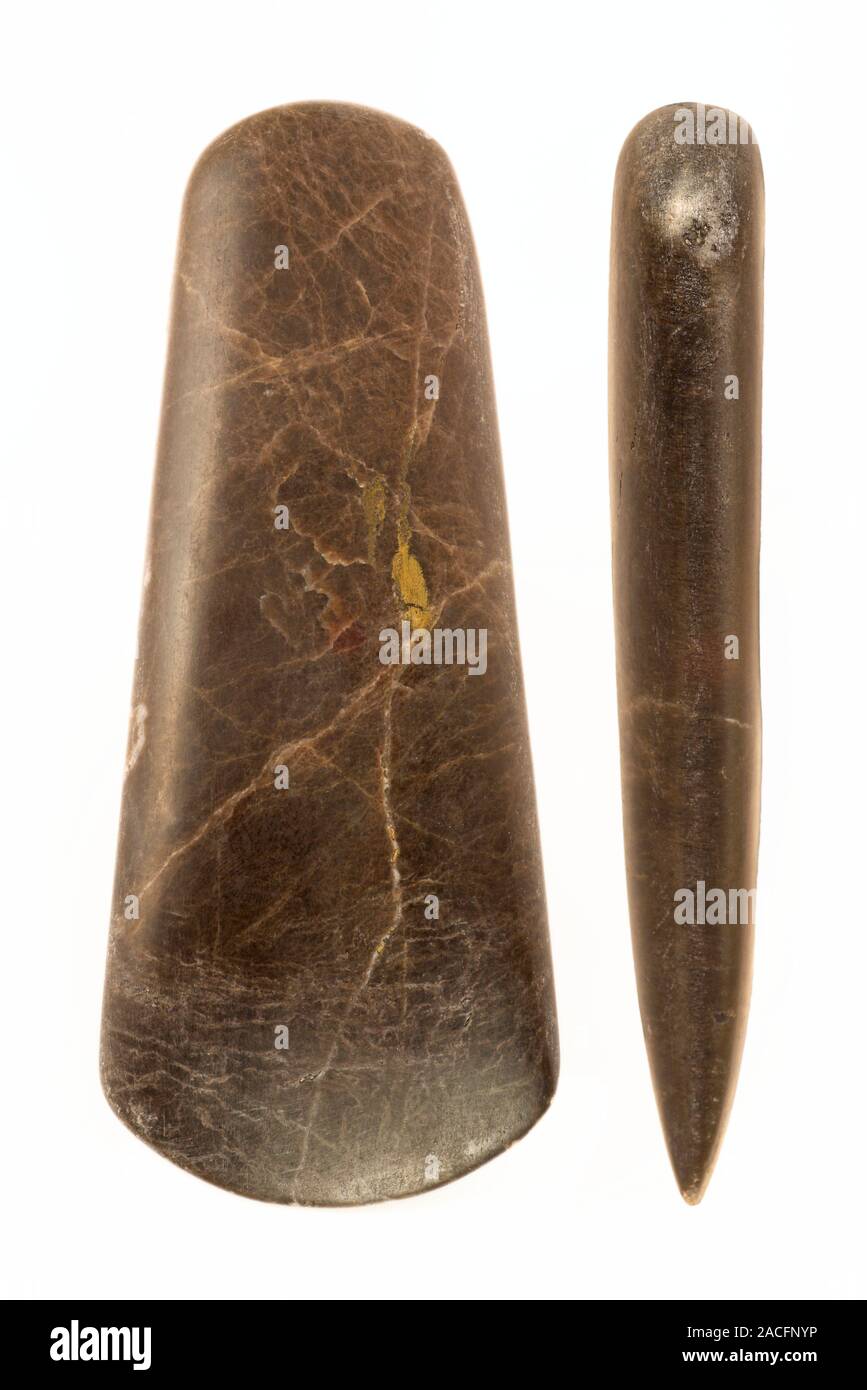 Stone axe head. Front view and side view of a modern polished stone axe ...