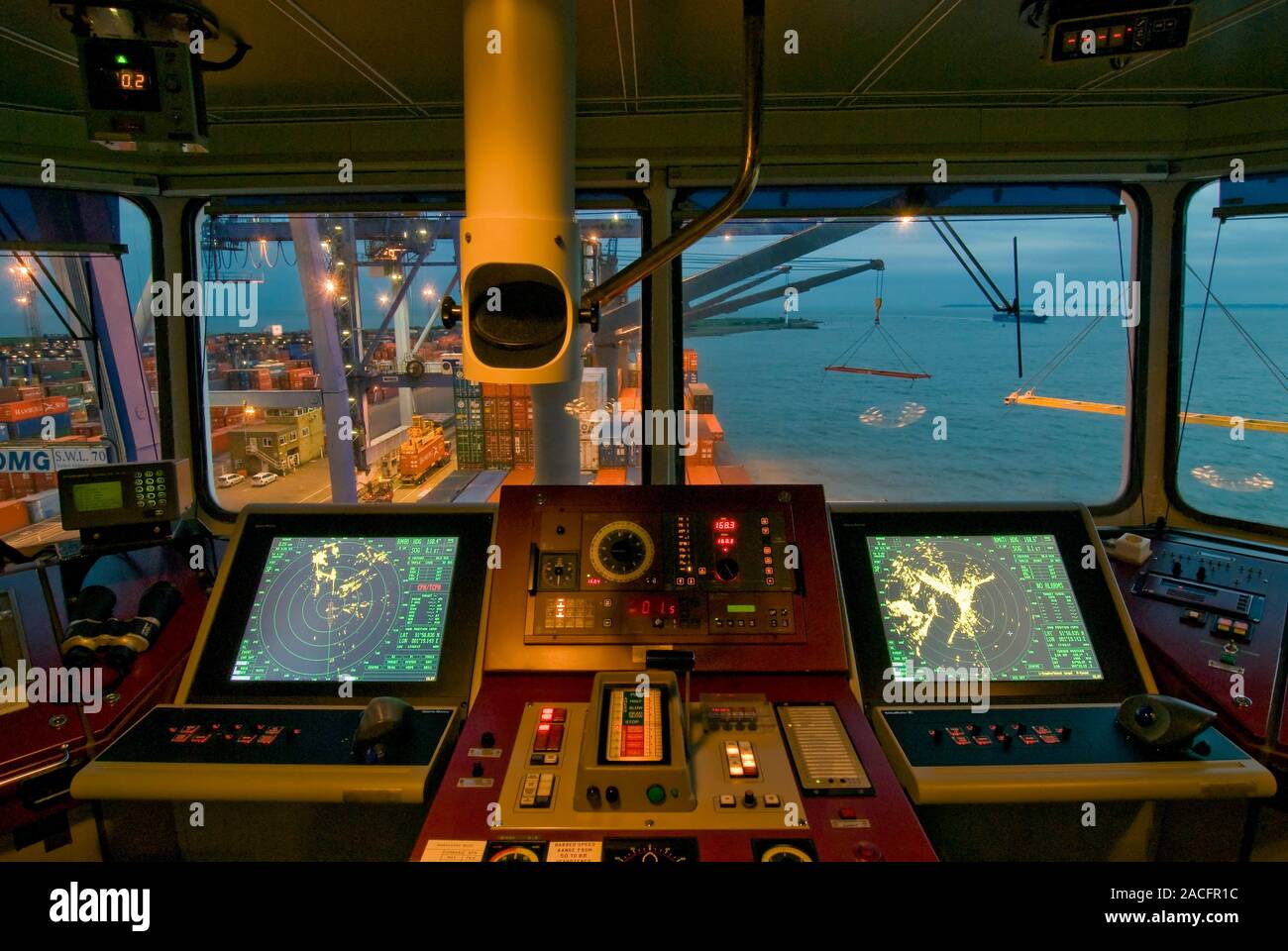Container ship controls, with a periscope (top) and radar screens (left ...