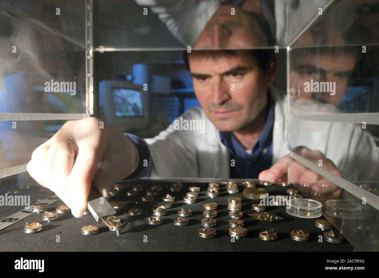 Marine bacteria in cancer research. Researcher Jean Guezennec preparing ...