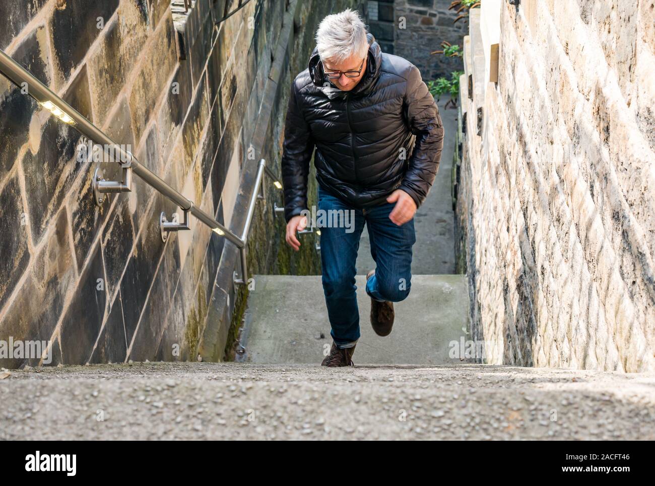 Man up ladder hi-res stock photography and images - Alamy