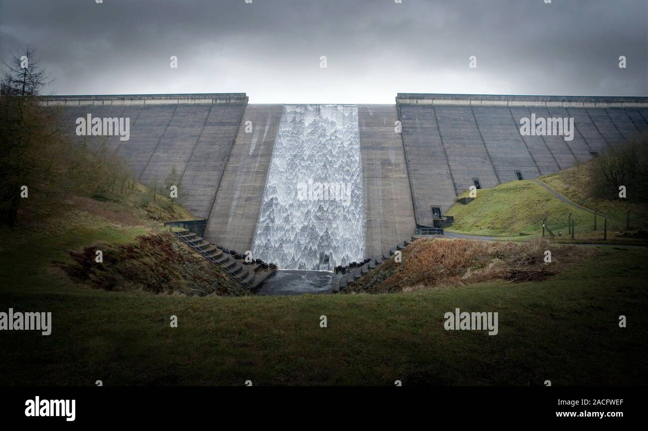Dam spillway. View looking up from the base of a dam to the top, along ...