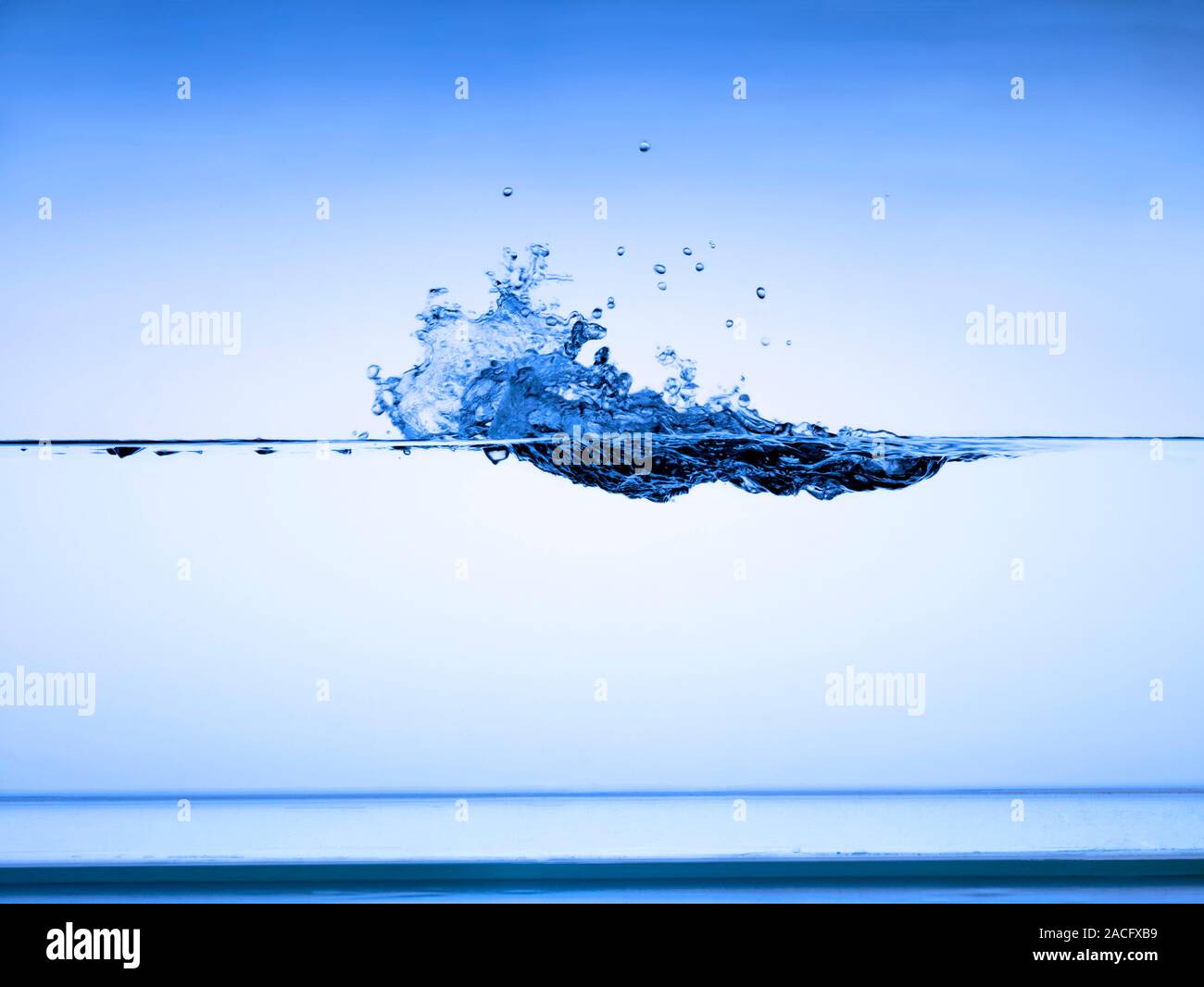 Water impact seen from above and below the water's surface Stock Photo ...