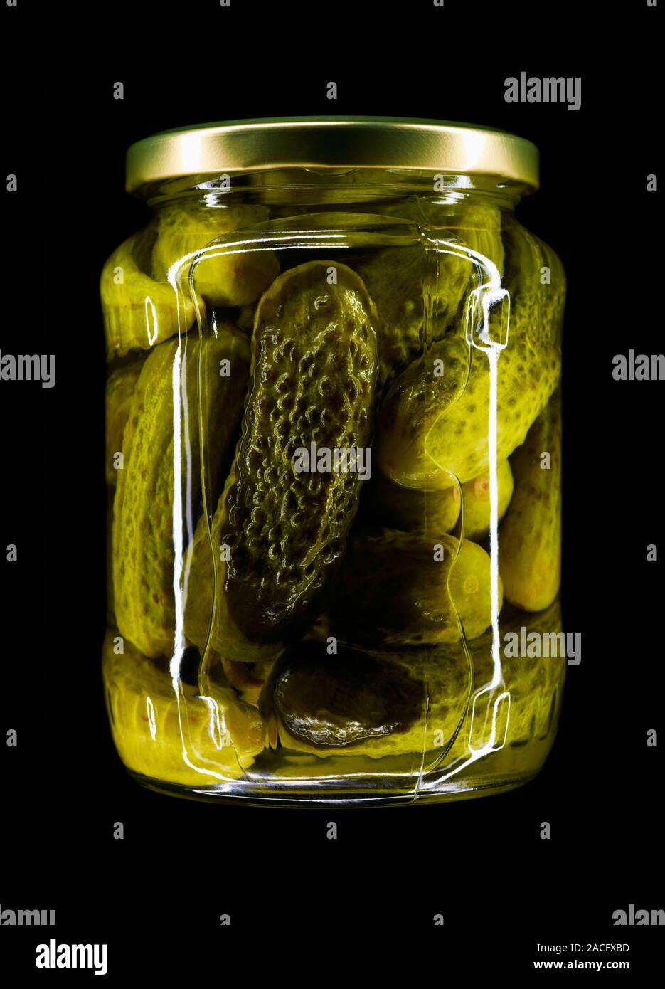 Pickled gherkins in a glass jar Stock Photo - Alamy