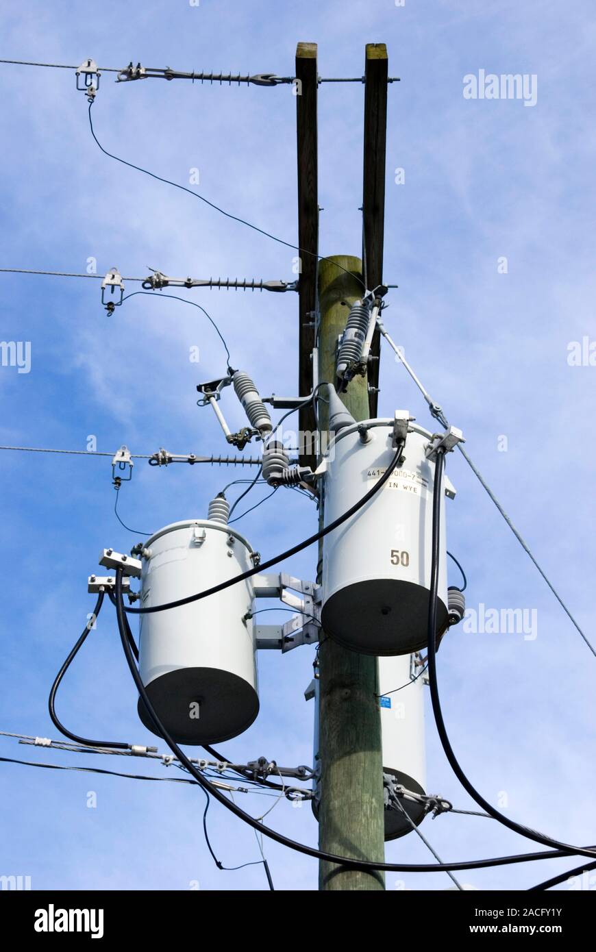 Electricity pole. Close-up of an electric power line pole with pole ...