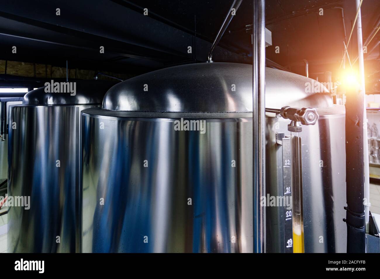 Fermentation tanks in small craft private microbrewery Stock Photo - Alamy