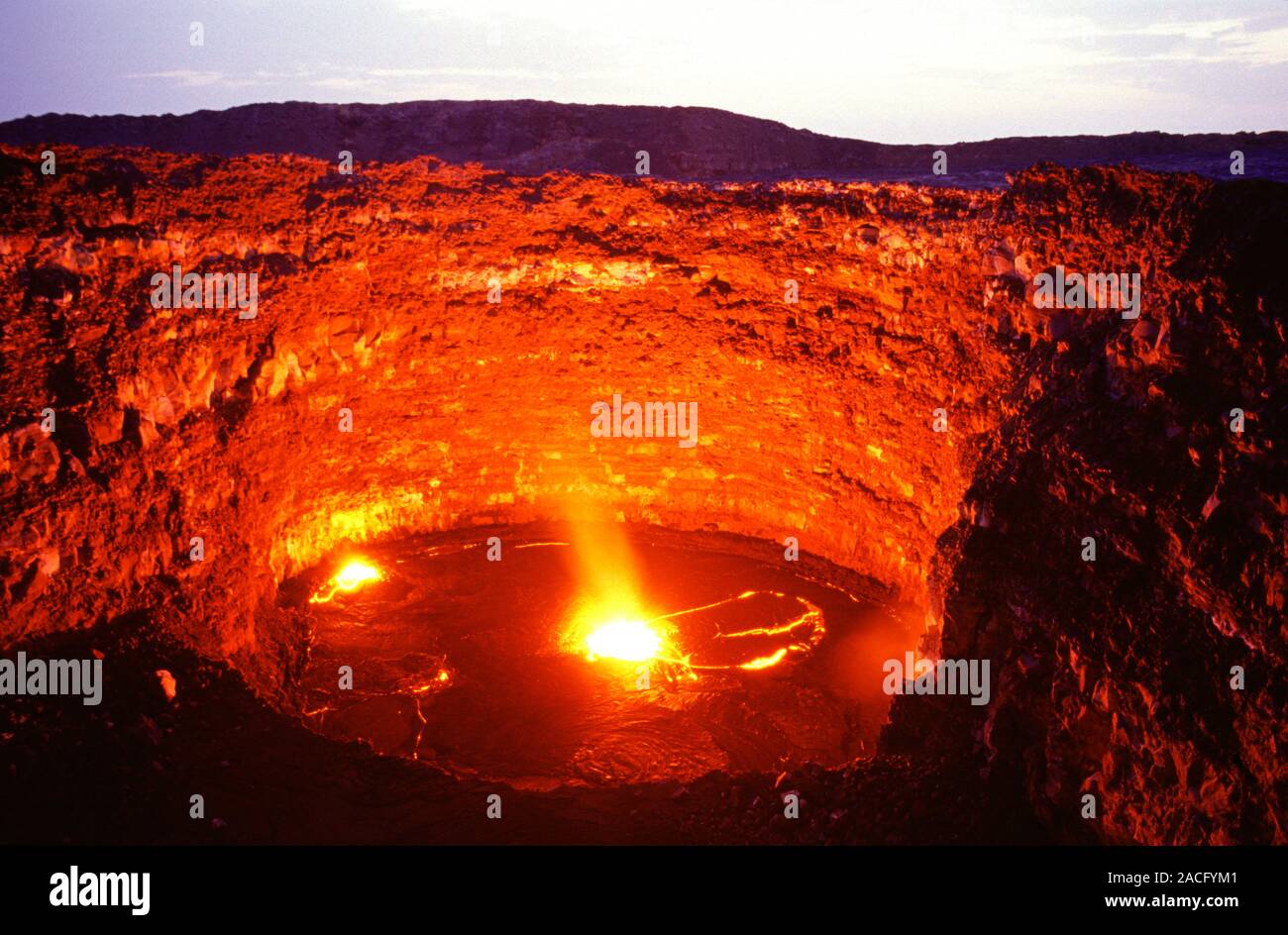 Lava lake. Molten lava inside a volcanic vent on the floor of a cinder ...