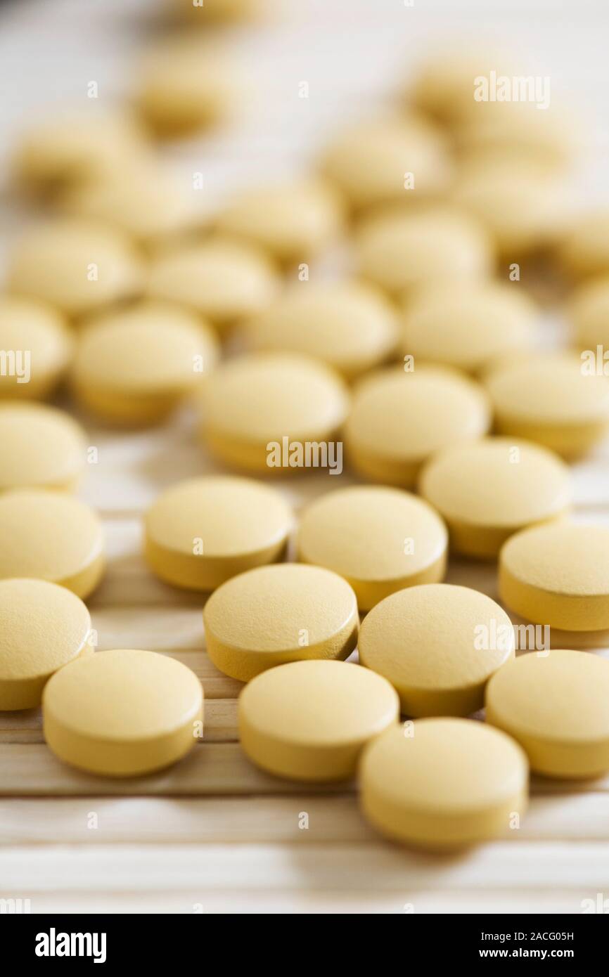 St. John's Wort (Hypericum perforatum) pills. The flowers are used in ...