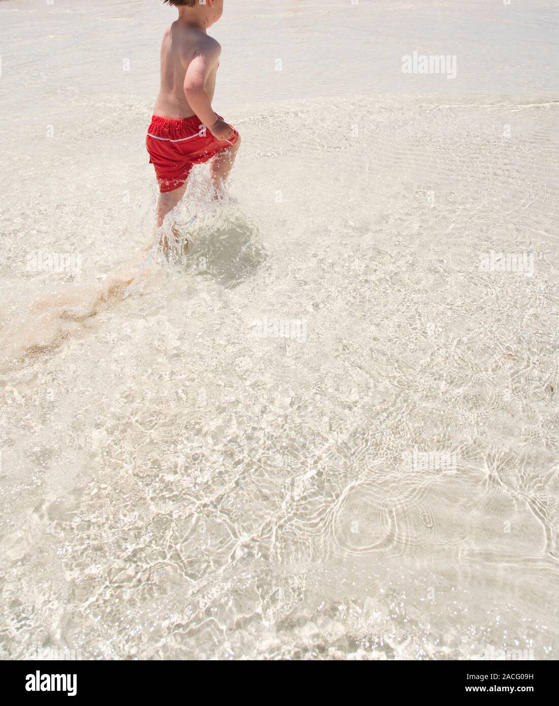 Splashing and running through water having lots of fun and feeling ...