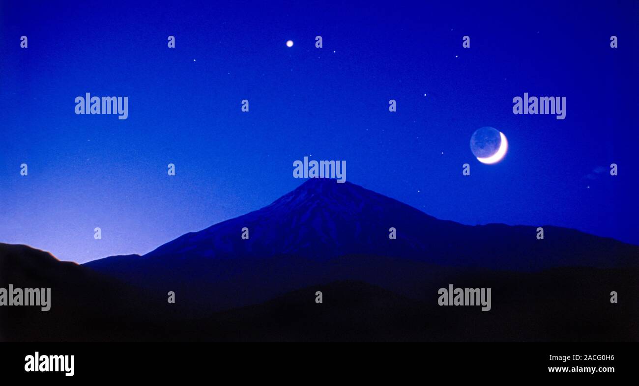 A nice clear night begins in Mount Damavand area. The Mountain, with an ...