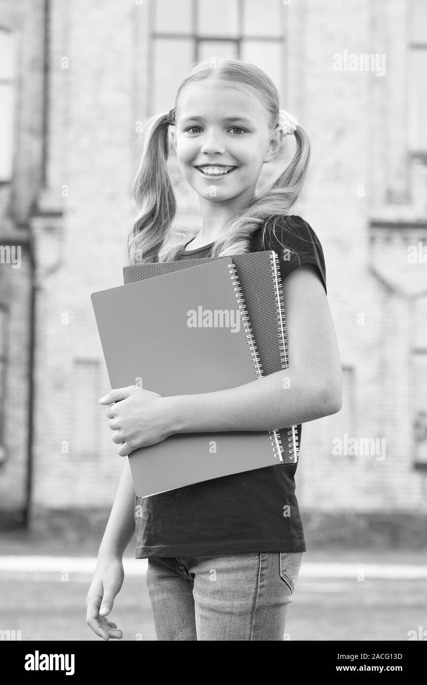 Library of her dreams. Cute library reader. Small child go to library ...