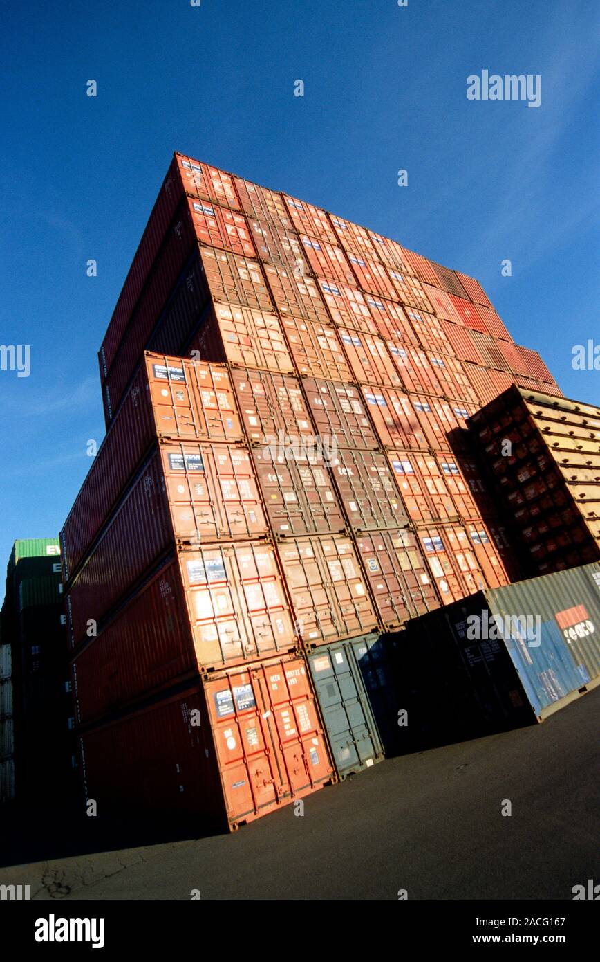 Stacked container cargo crates at a port. The container system is an ...
