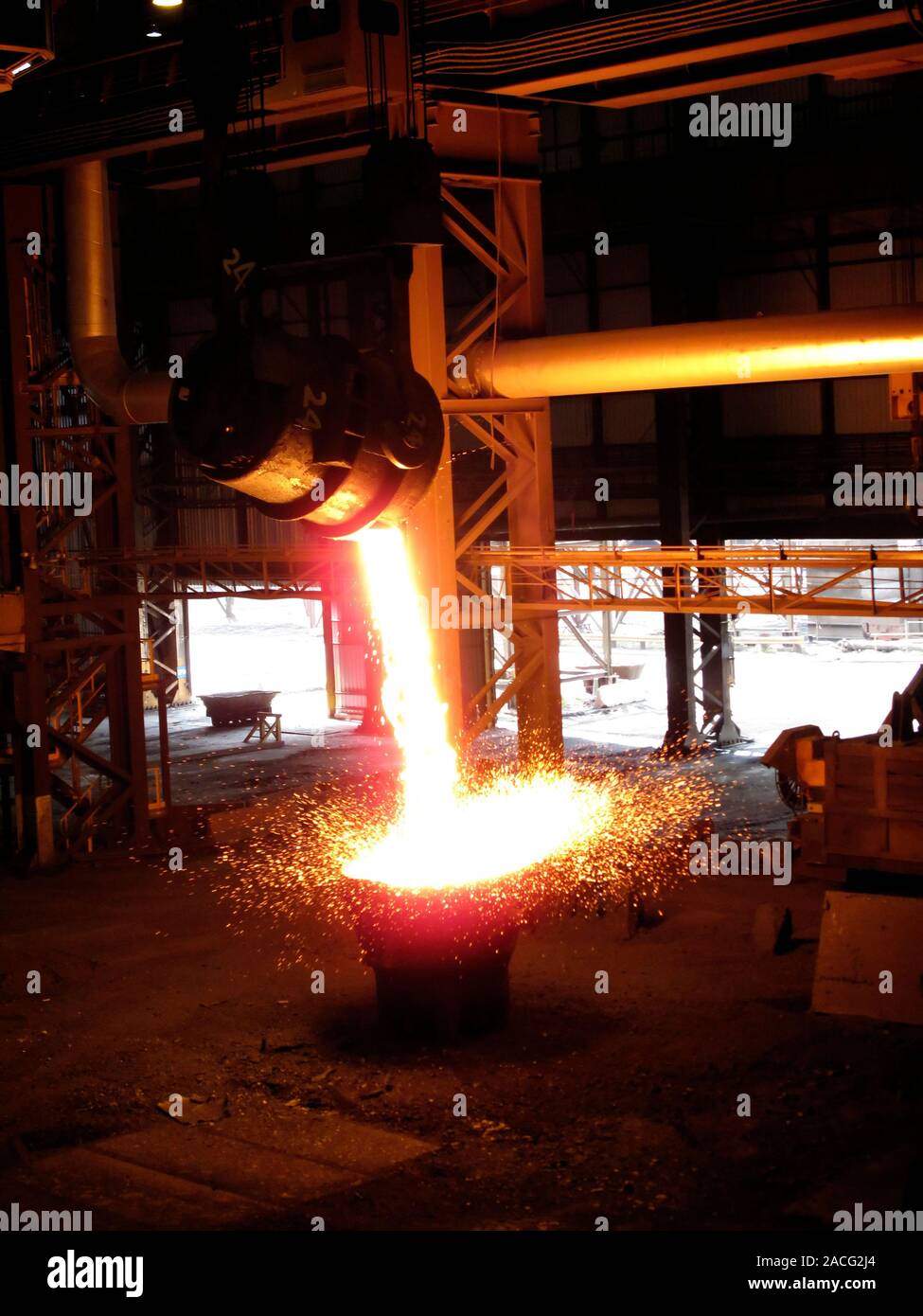 Molten steel slag being poured at a metal working plant Stock Photo - Alamy