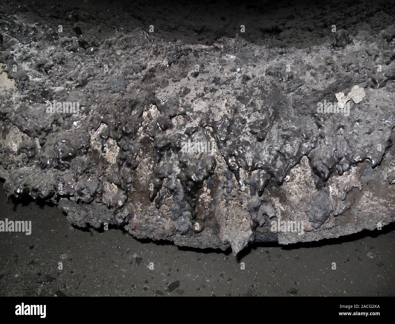 Slag from a steelworks. Slag is the waste product from the smelting of ...