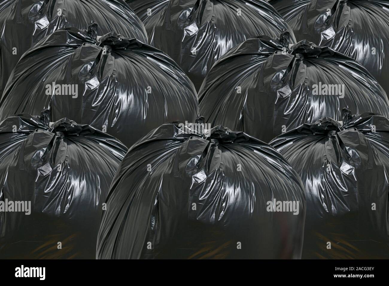 Full dustbin bags Stock Photo - Alamy