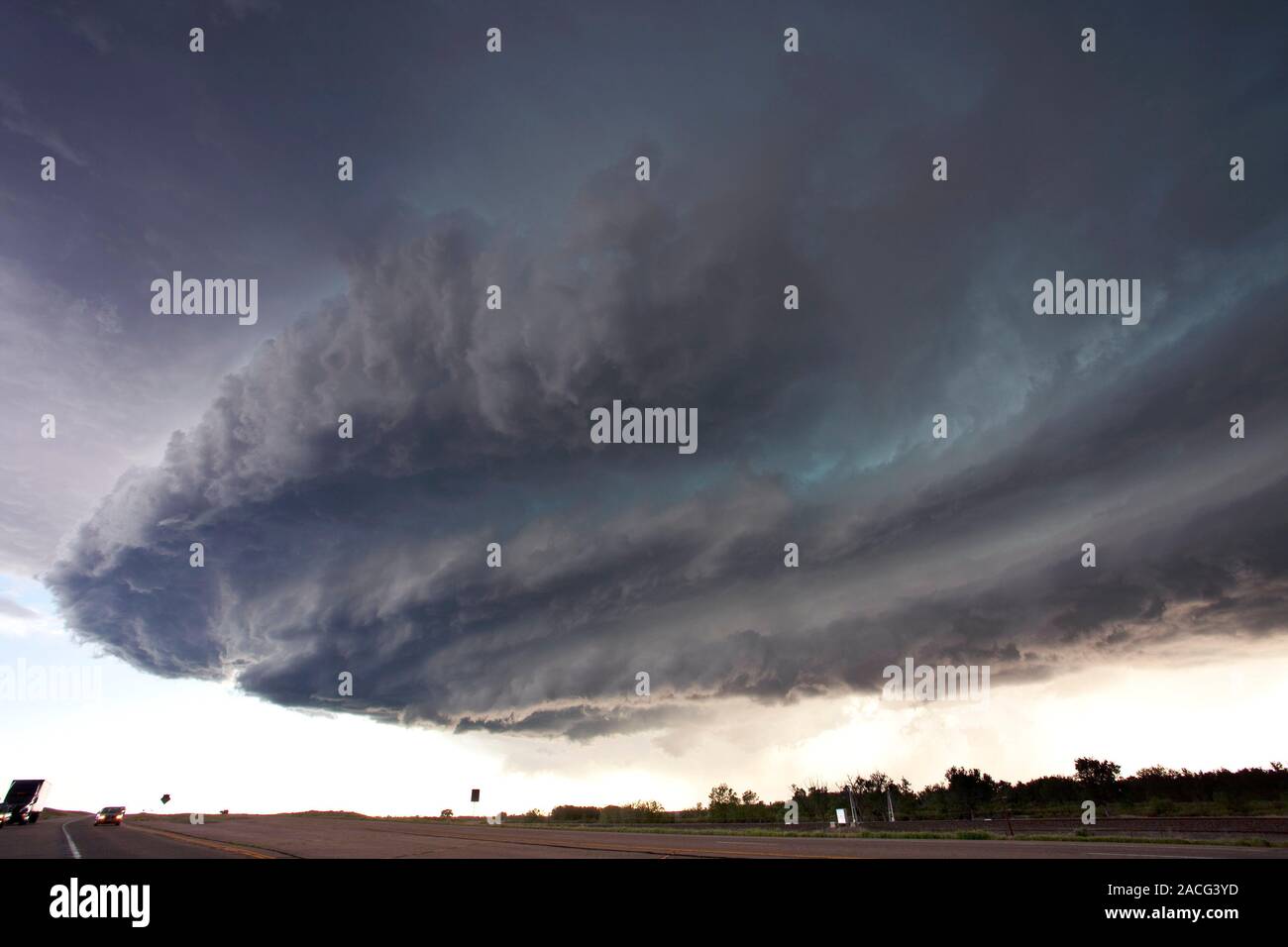 Supercell thunderstorm over fields. A supercell thunderstorm is a ...