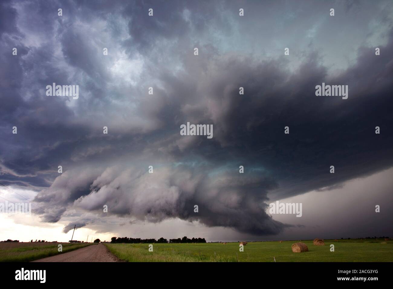 Supercell thunderstorm over fields. A supercell thunderstorm is a ...