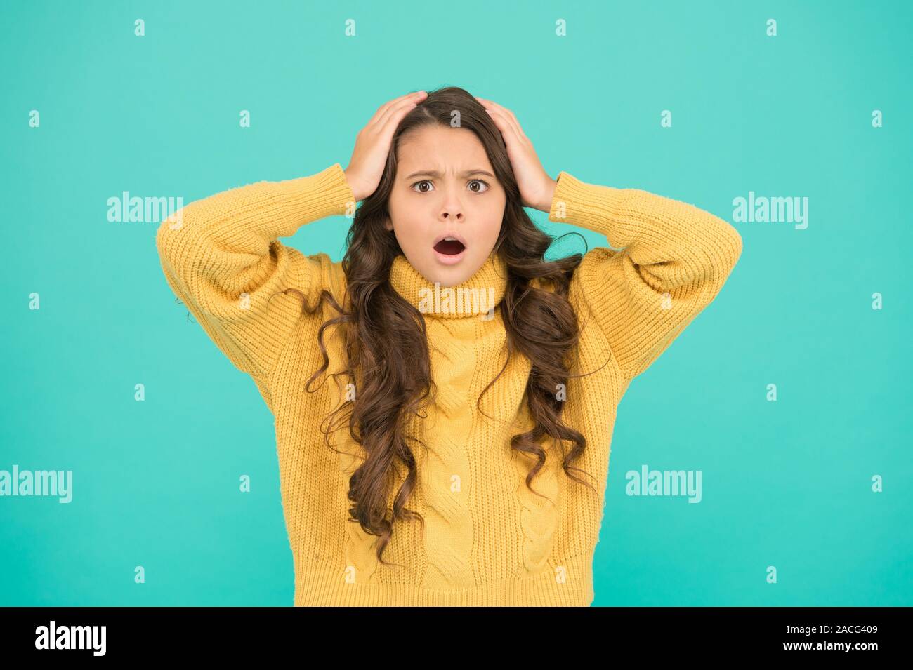 Kids psychology. Feeling surprised. Adorable surprised girl wear yellow ...