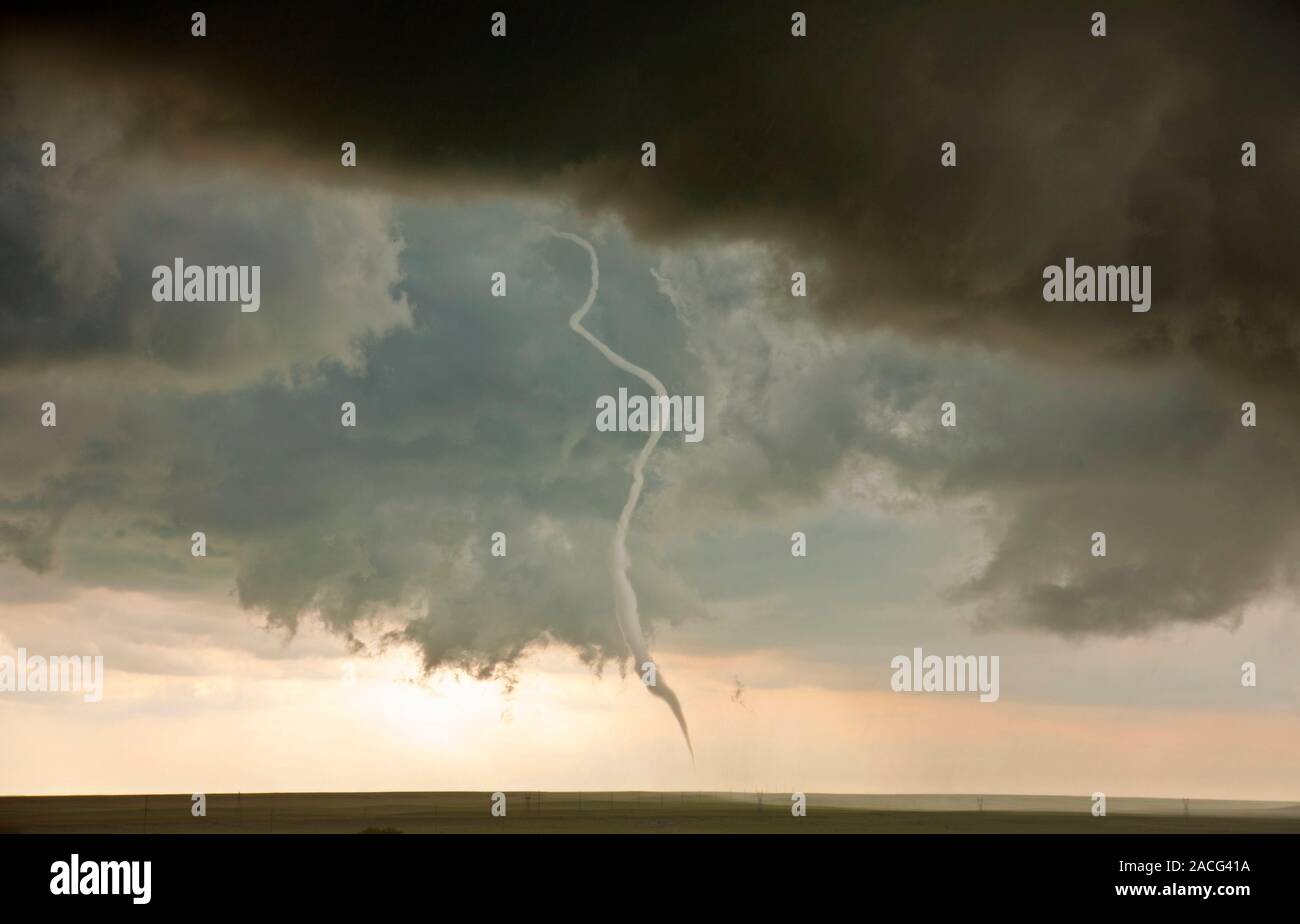 Supercell thunderstorm and tornado over fields. A supercell ...