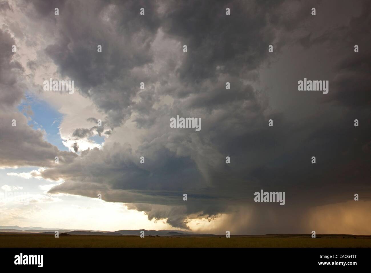 Supercell thunderstorm with a wall cloud and large precipitation core ...