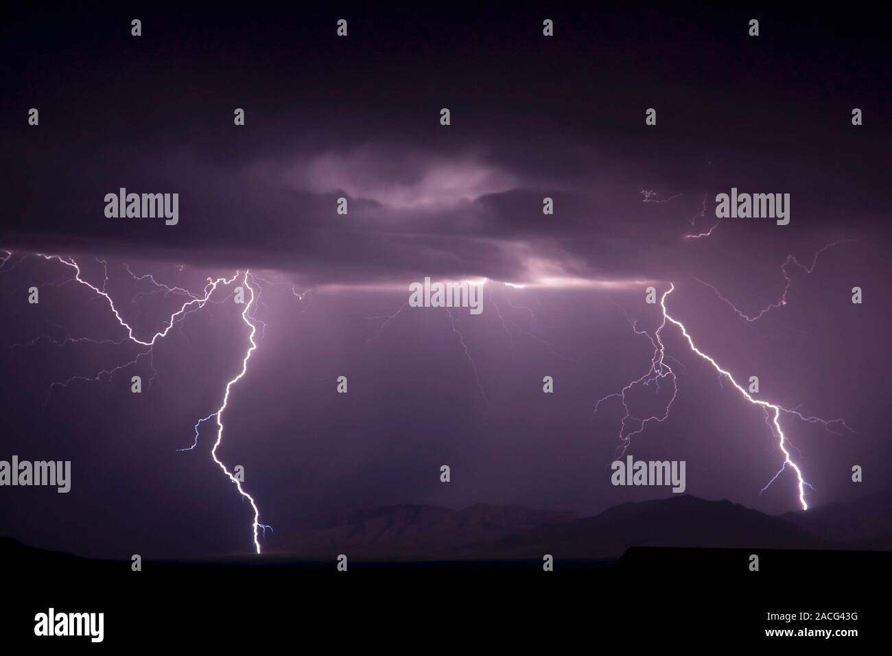 Huge electrical storm. Long exposure photograph of lightning repeatedly ...