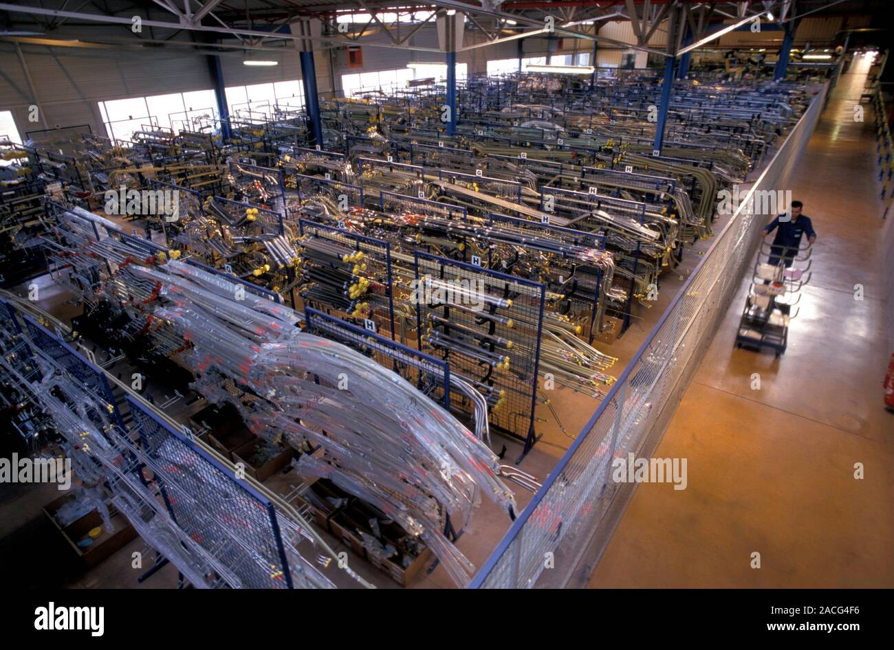 Passenger aircraft construction. Worker in the storehouse that holds ...
