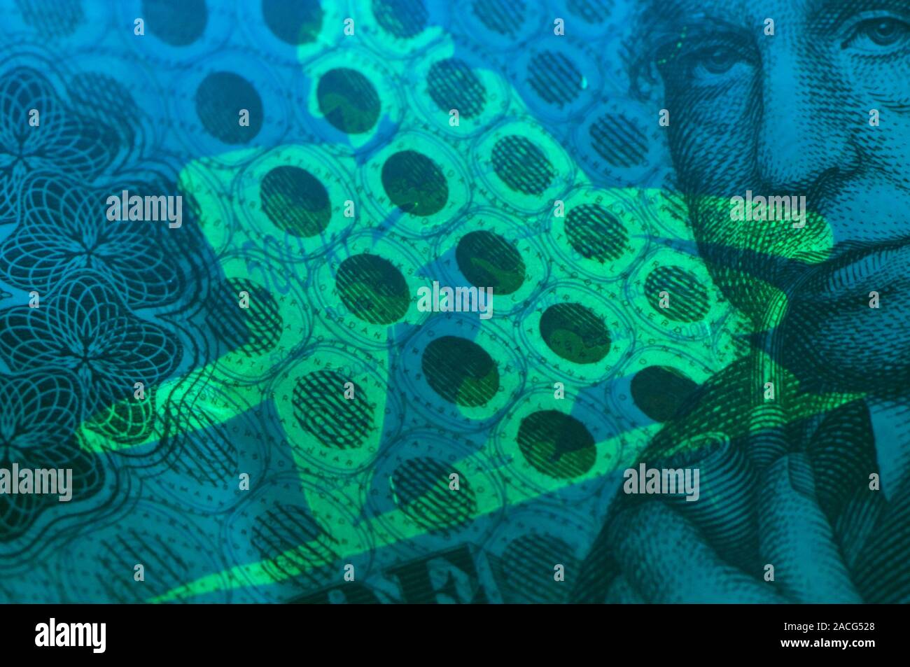 Danish banknote in UV light, close up. The design on this 500 kroner ...