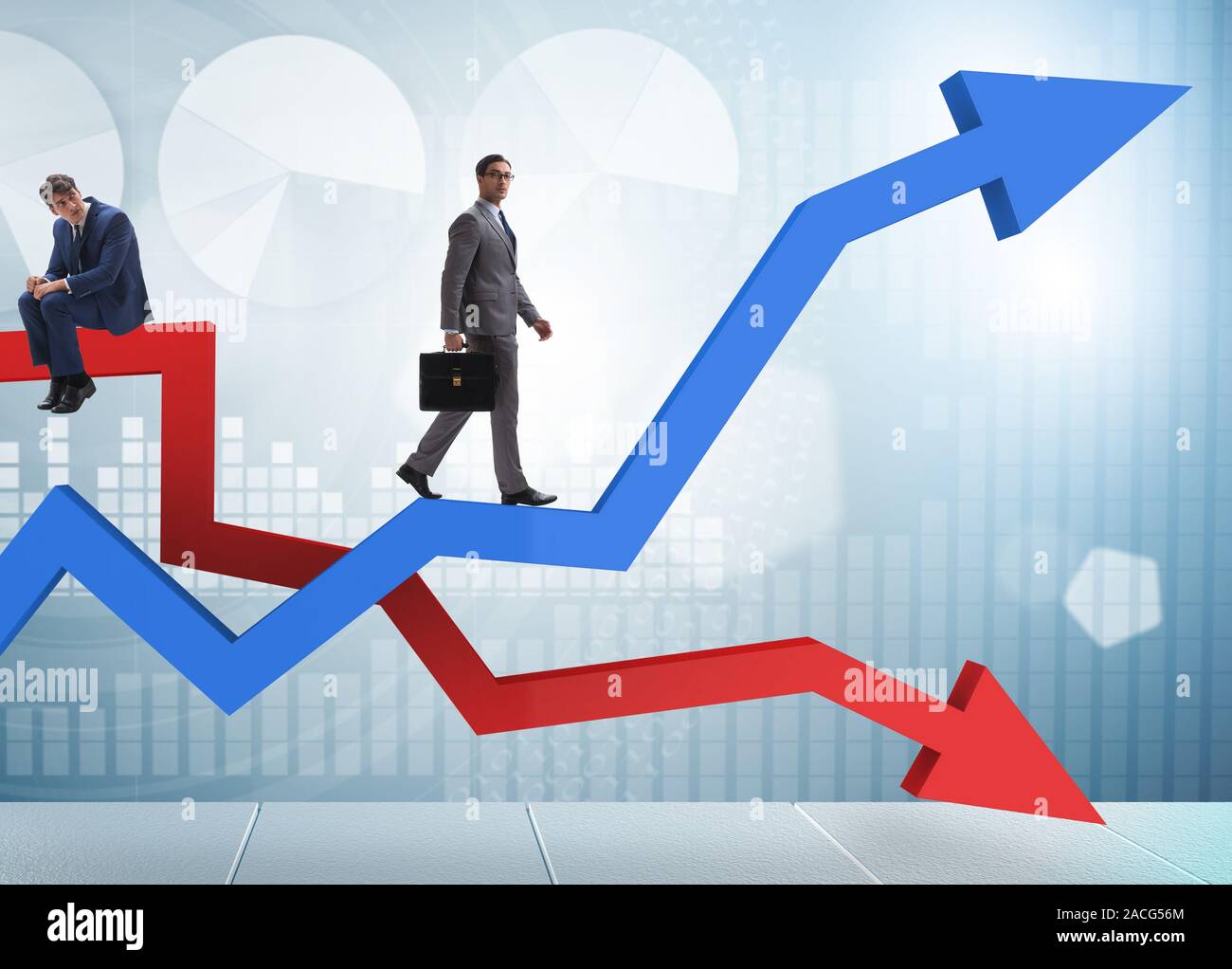 Businessman with charts of growth and decline Stock Photo - Alamy