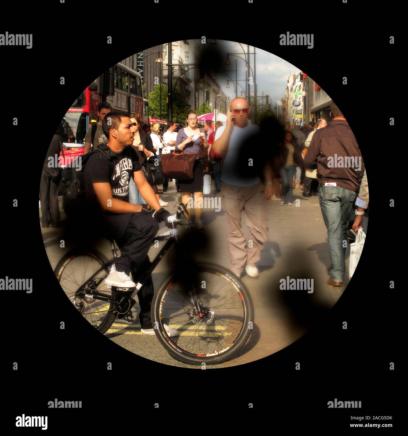 Diabetic retinopathy. Patient's-eye view of a busy city street, in a ...