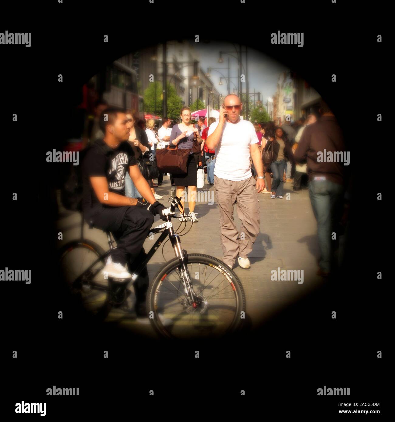 Glaucoma. Patient's-eye view of a busy city street, in a patient with ...