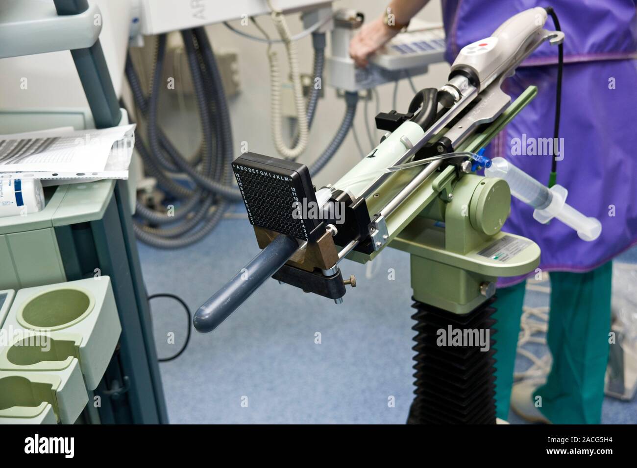 Prostate cancer radiotherapy equipment. The grey cylindrical rod is a ...