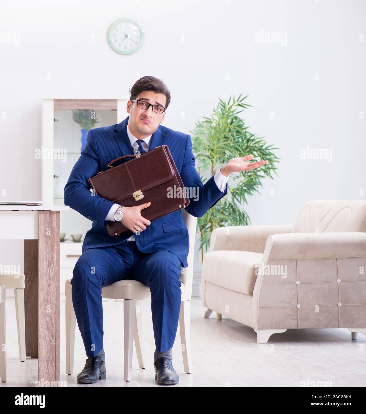 The bankrupt businessman angry and upset at home Stock Photo - Alamy