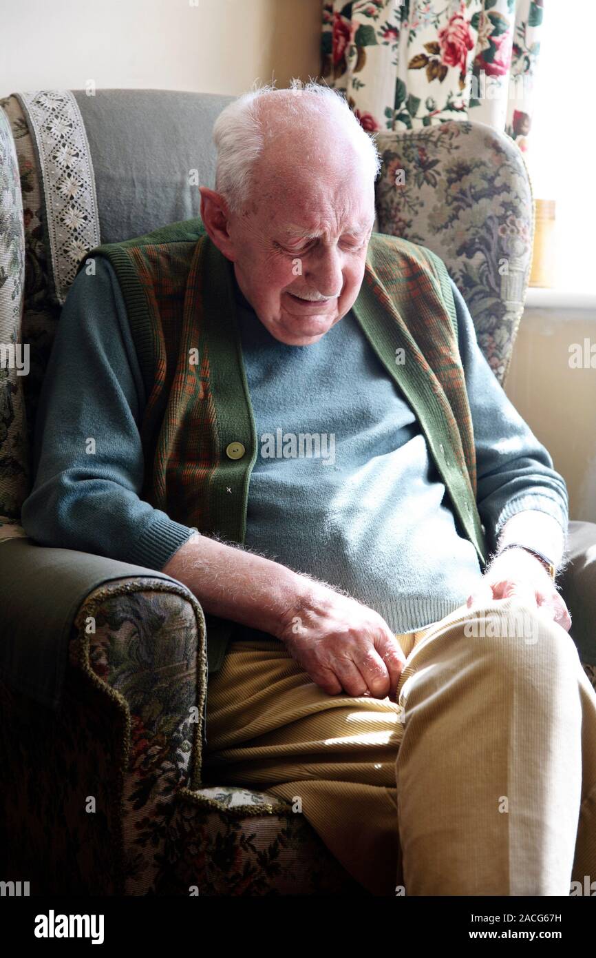 Elderly man. 95-year-old man sitting in an armchair in his home Stock ...