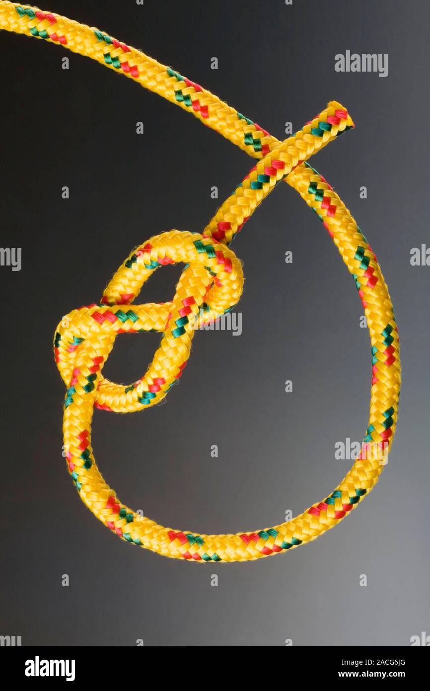 Figure of eight knot tied in a rope Stock Photo - Alamy