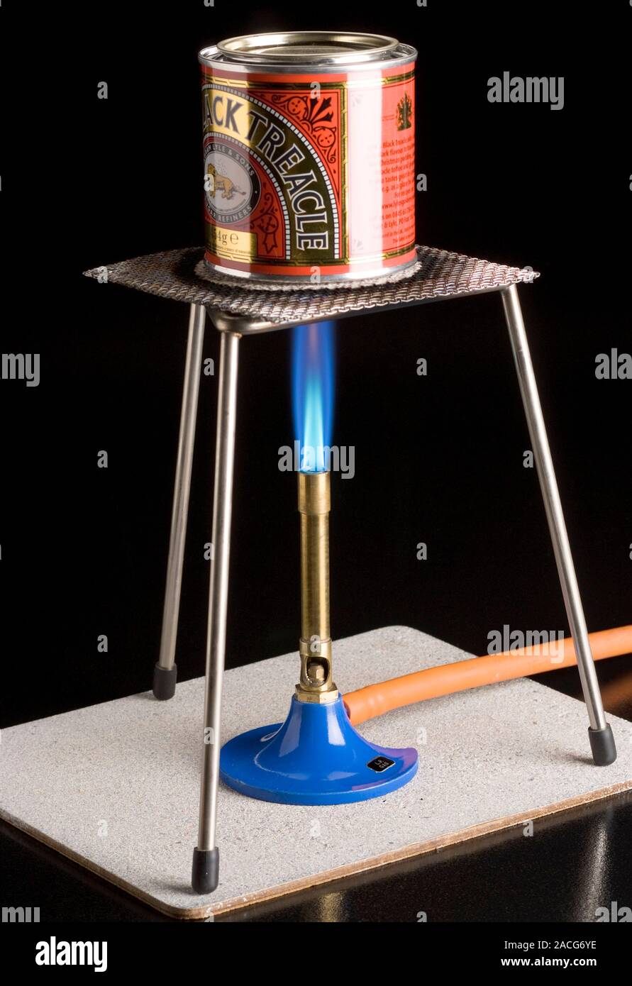 Heating a sealed container. Experiment being conducted to demonstrate ...