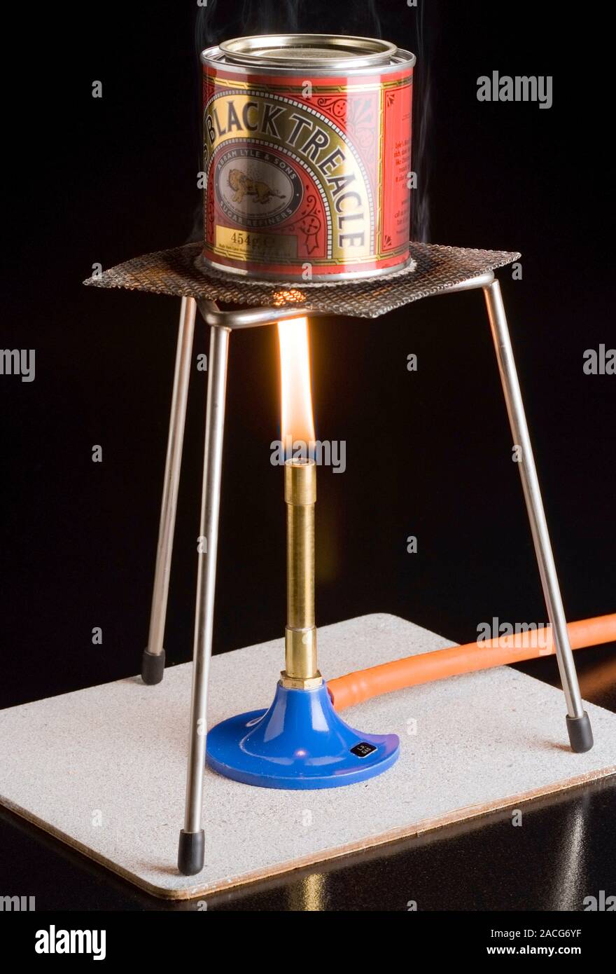 Heating a sealed container. Experiment being conducted to demonstrate ...