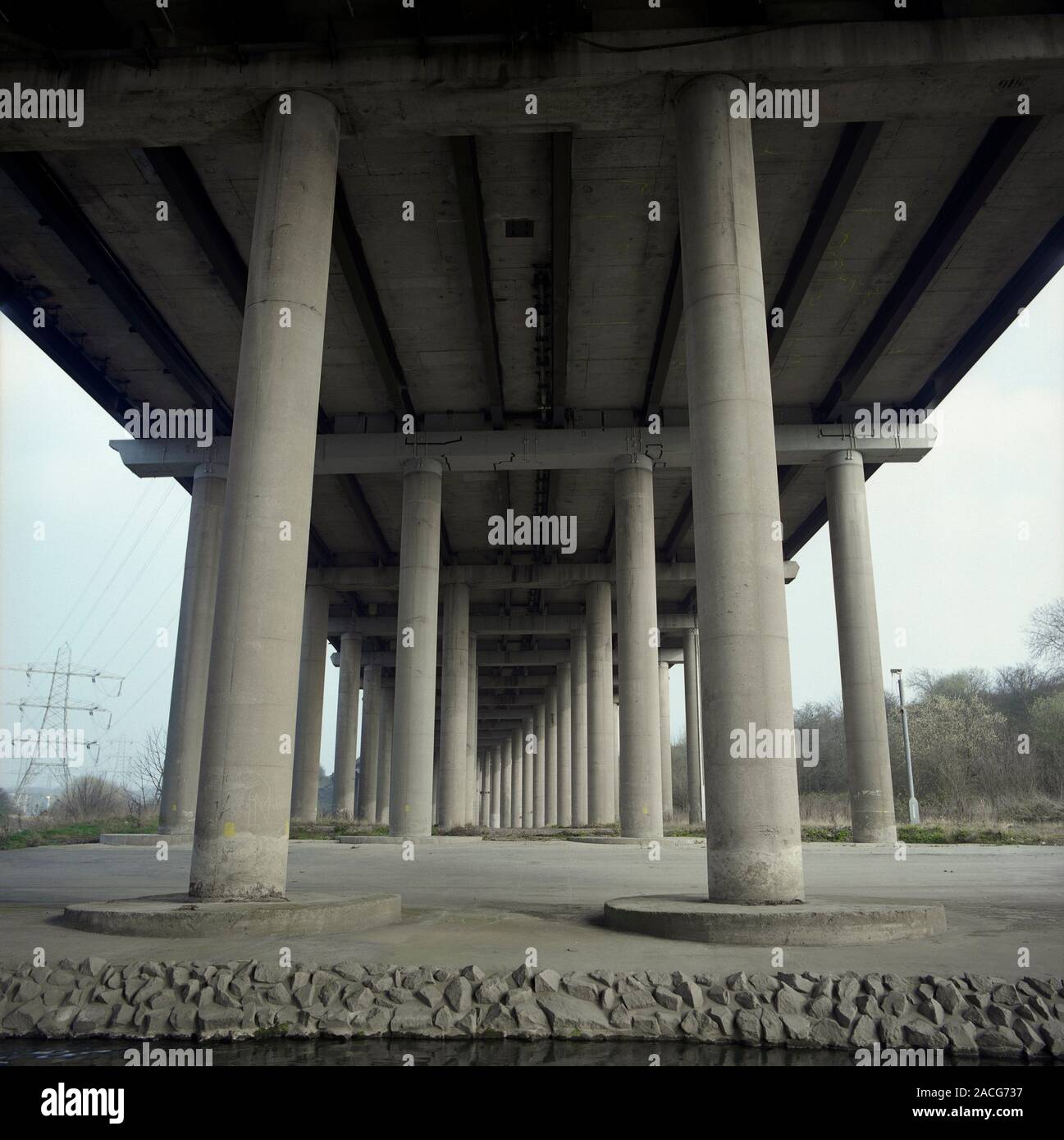 Motorway flyover. Pillars beneath an M6 flyover. photographed in the ...