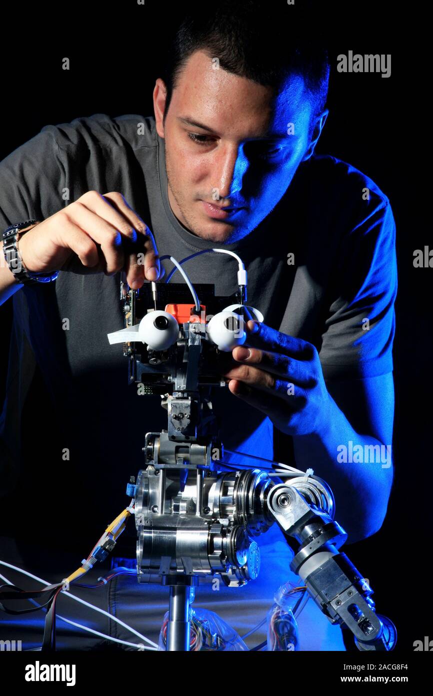 iCub robot and researcher. The iCub is a small humanoid robot designed ... iCub robot and researcher. The iCub is a small humanoid robot designed ...