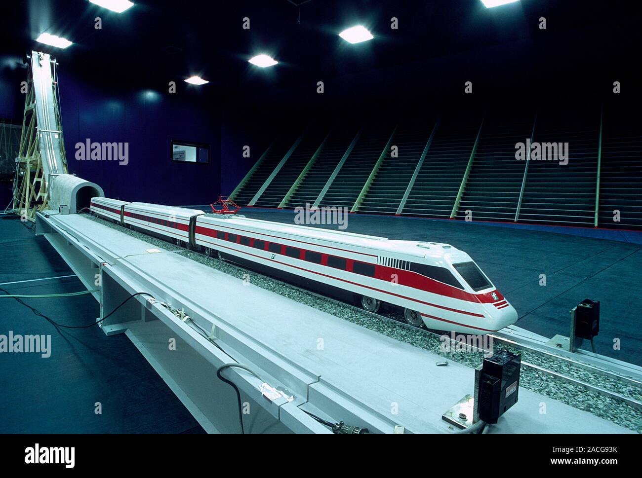 Train wind tunnel test. Model high-speed train on a track in a wind ...