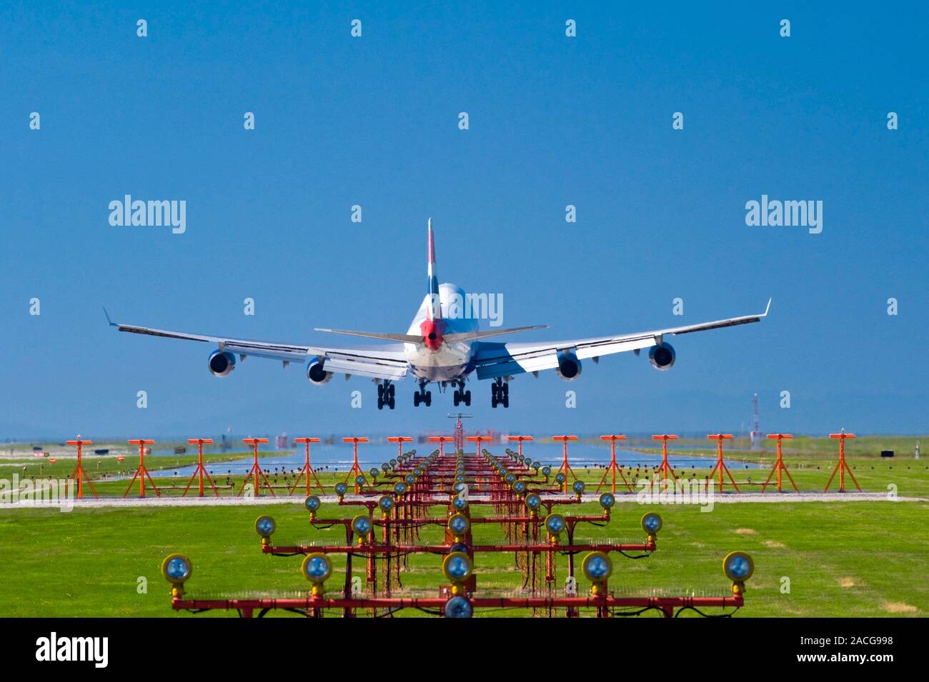 Aeroplane landing. Boeing 747 landing at Vancouver International ...