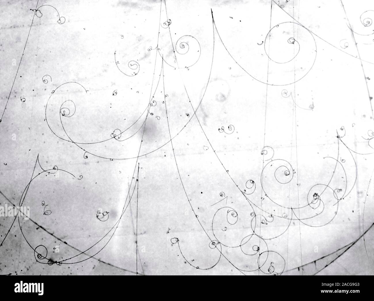 Tracks of electrons and positrons. These tracks show part of a shower ...